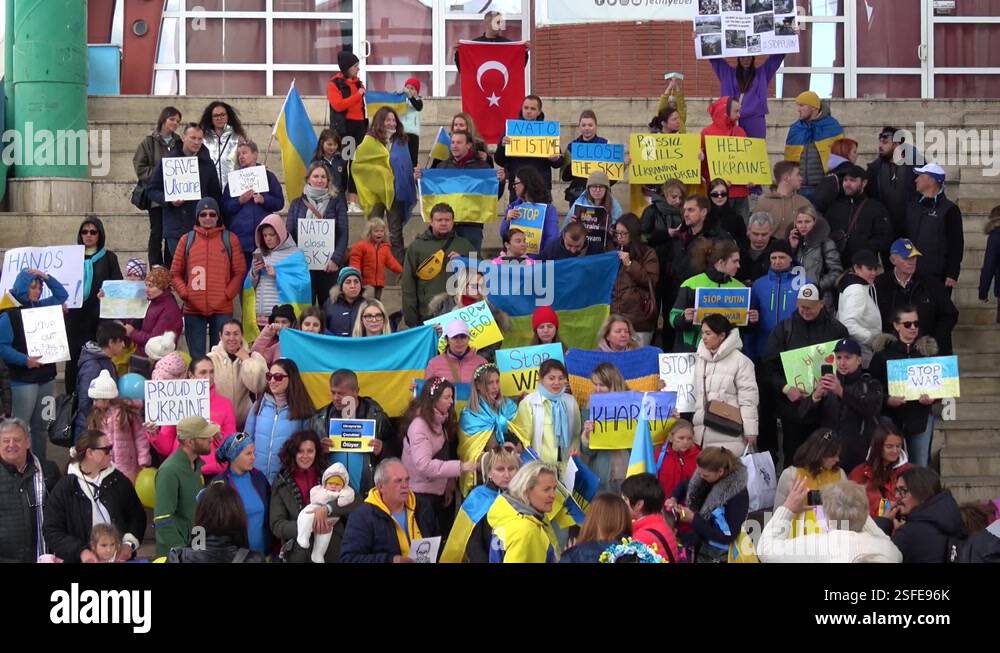 Tilt down the group of people on the meeting against war Stock Video ...