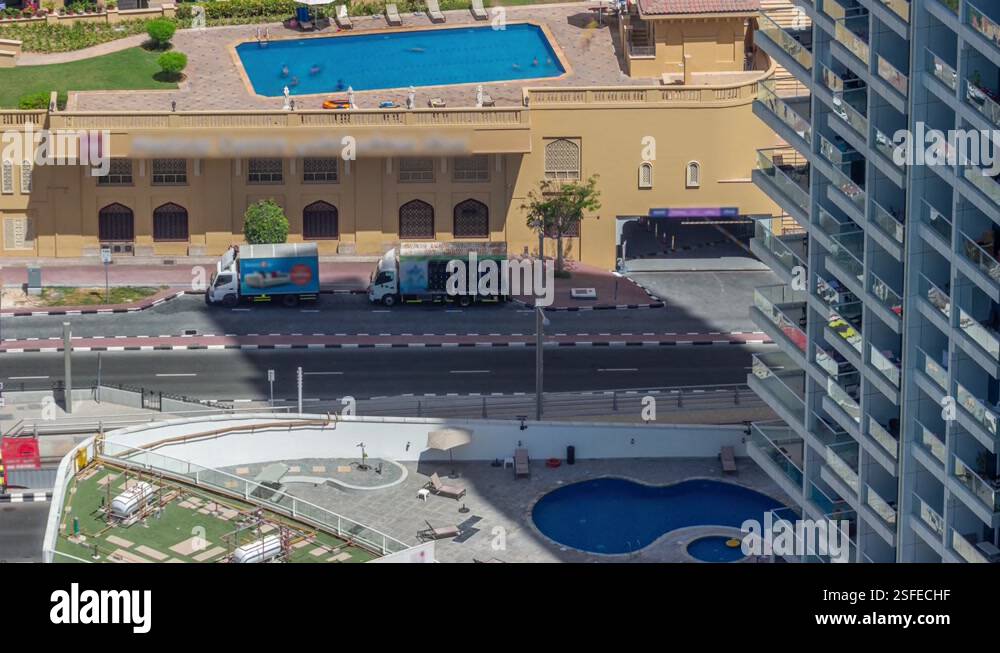 Rooftop swimming pool viewed from above timelapse, Aerial top view at ...