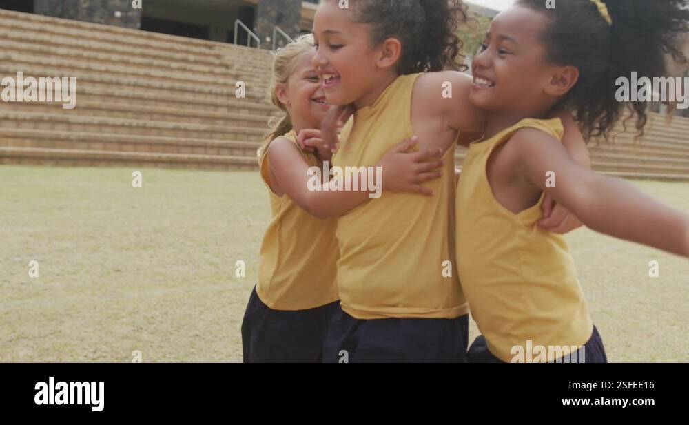 Video of legs of diverse girls hugging after soccer match in front of ...