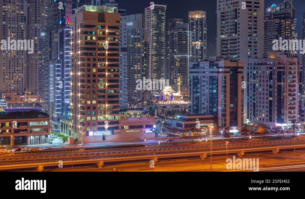 Dubai Marina skyline with Mohammad Bin Ahmed Al Mulla mosque aerial ...