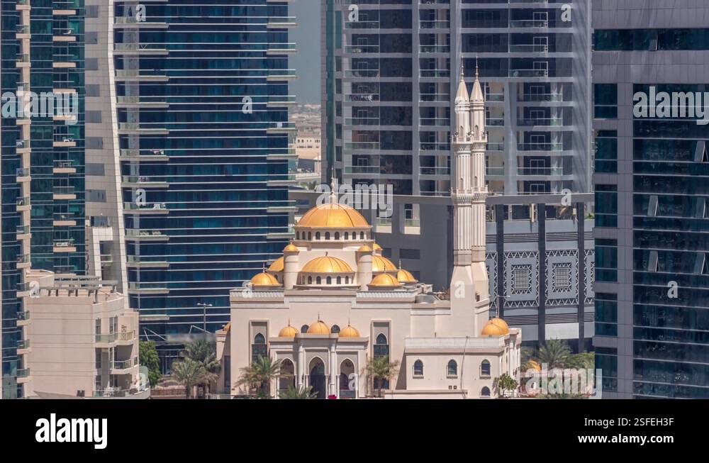 Dubai Marina skyline with Mohammad Bin Ahmed Al Mulla mosque aerial ...