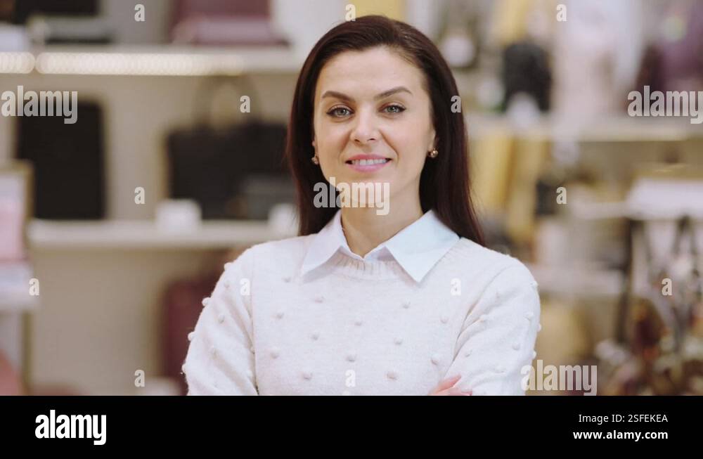Smiling large amazing saleswoman in front of the camera and showing a ...