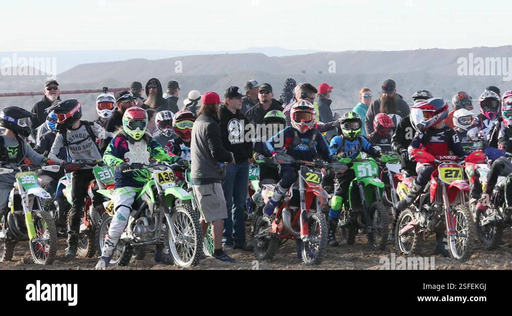 Teenage Desert motorcycle race starting line getting ready for start 4K ...