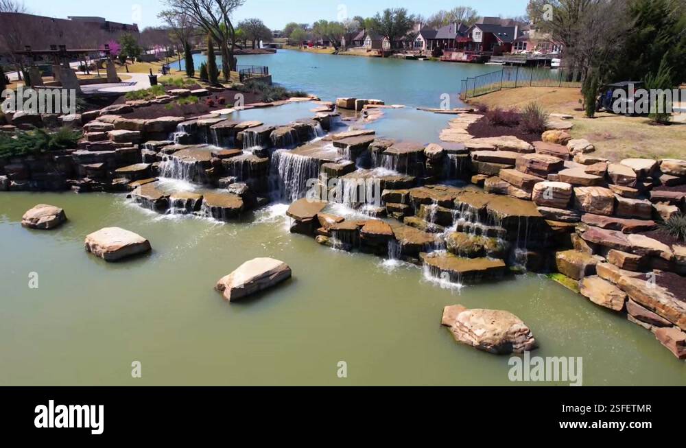 Aerial footage of a rock formation at the Riverwalk in Flowermound ...