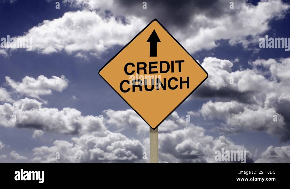 Money and finance problems. Credit Crunch road sign with time lapse ...