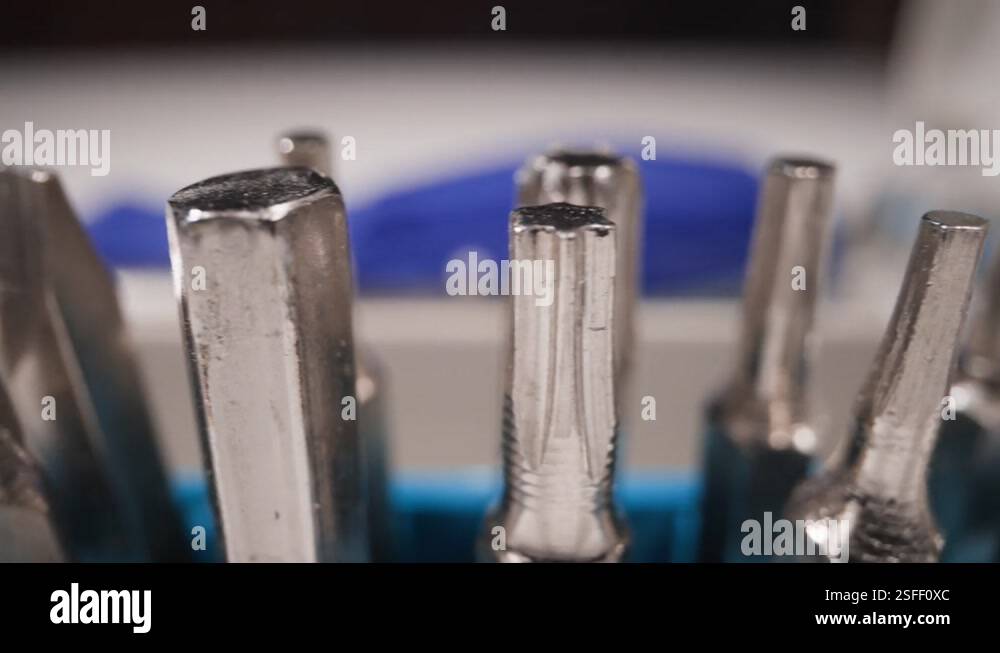 Collection of shaped metal bits for screwdriver in toolbox Stock Video ...