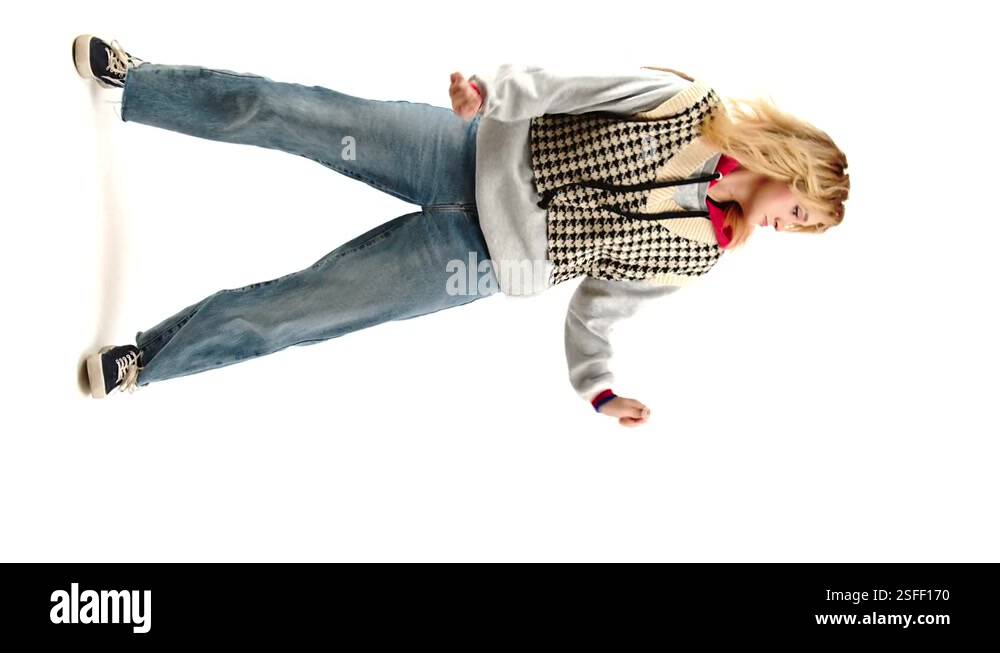 Hipster Girl In Loose Clothes Dancing Freestyle To Contemporary Funky ...