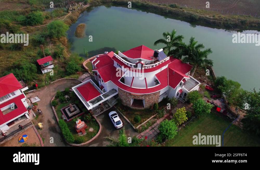 Rotating aerial drone view of a complex of summer houses for vacations ...