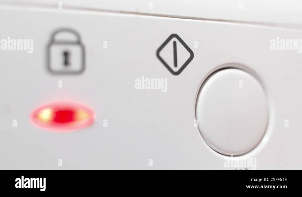 Washing machine door indicator. The finger presses the button to turn ...