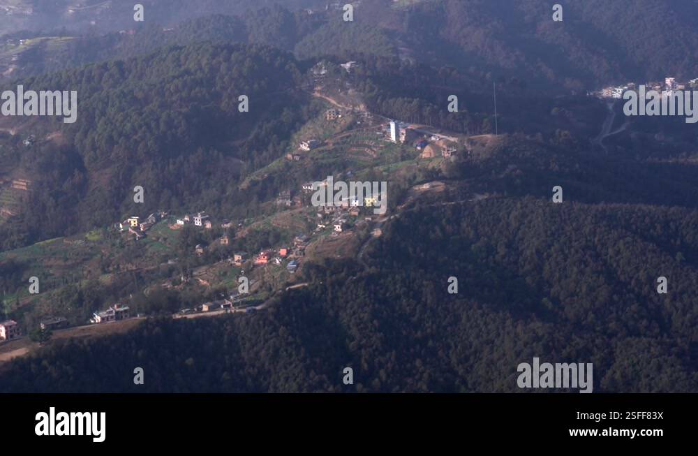 An aerial view of the foothills of Nepal sprinkled with villages and ...