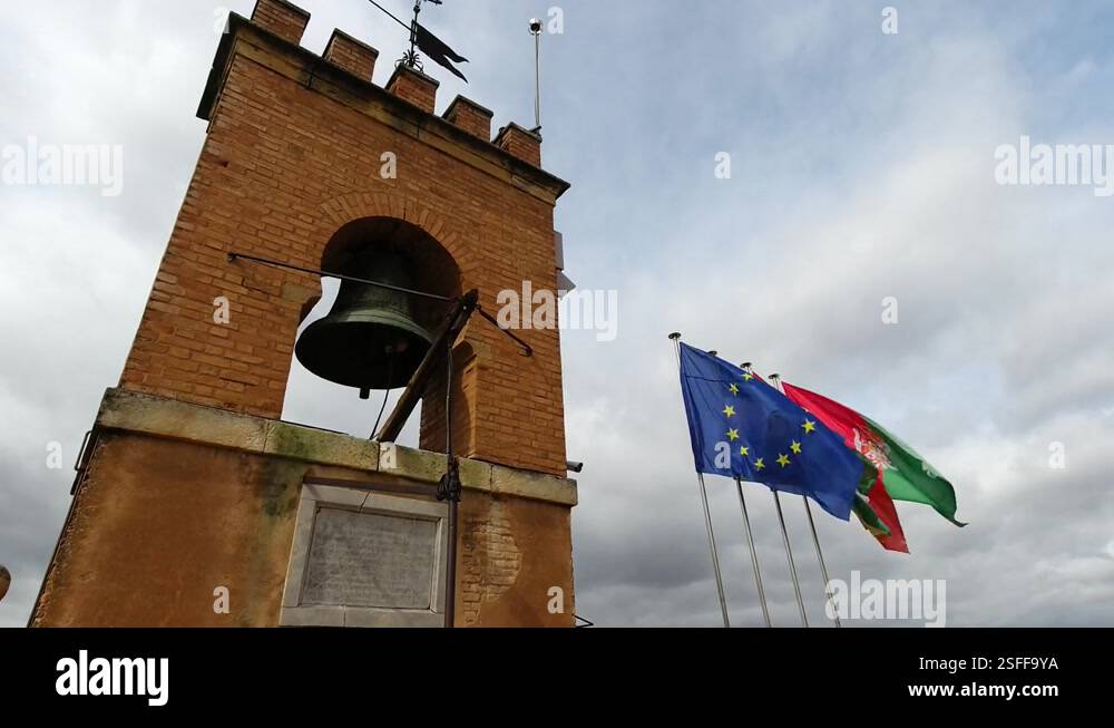 Looking up at clock tower in Alhambra Palace, Granada with European ...