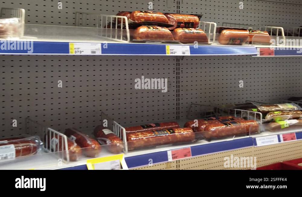 Sausage shelves. The interior of the store - a warehouse for the sale ...