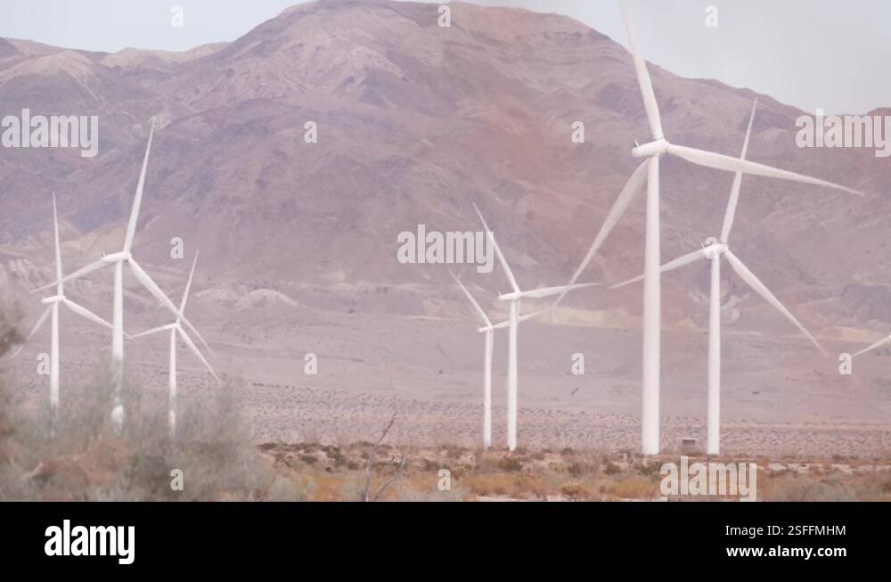 Windmills on wind farm, wind mill energy generators. Desert windfarm ...