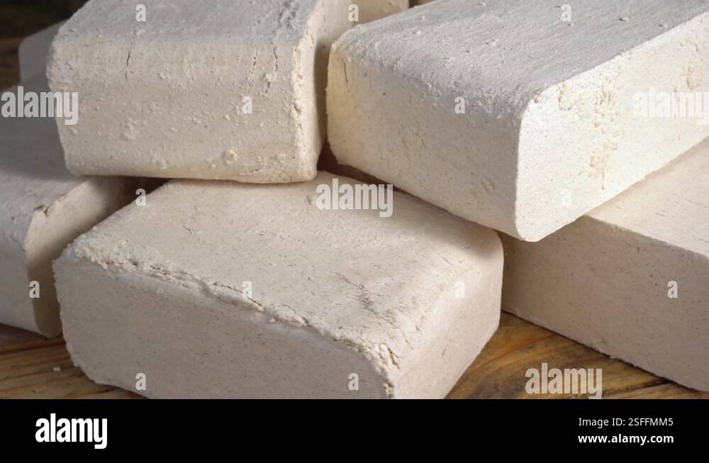 A briquette is a compressed block of combustible biomass material e.g ...