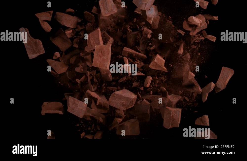 Super Slow Motion Shot of Rotating Chocolate Chunks and Cocoa Powder ...