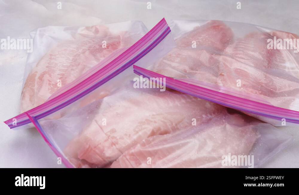 Fresh raw fish fillet in zip lock bags Stock Video Footage - Alamy