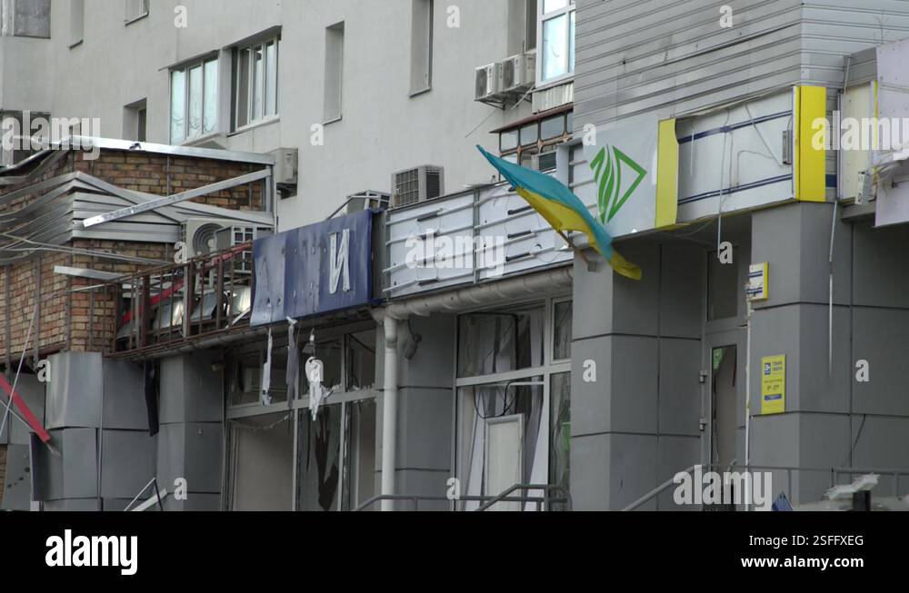 Bucha. War in Ukraine. Ukrainian flag on a house bombed by Russian ...