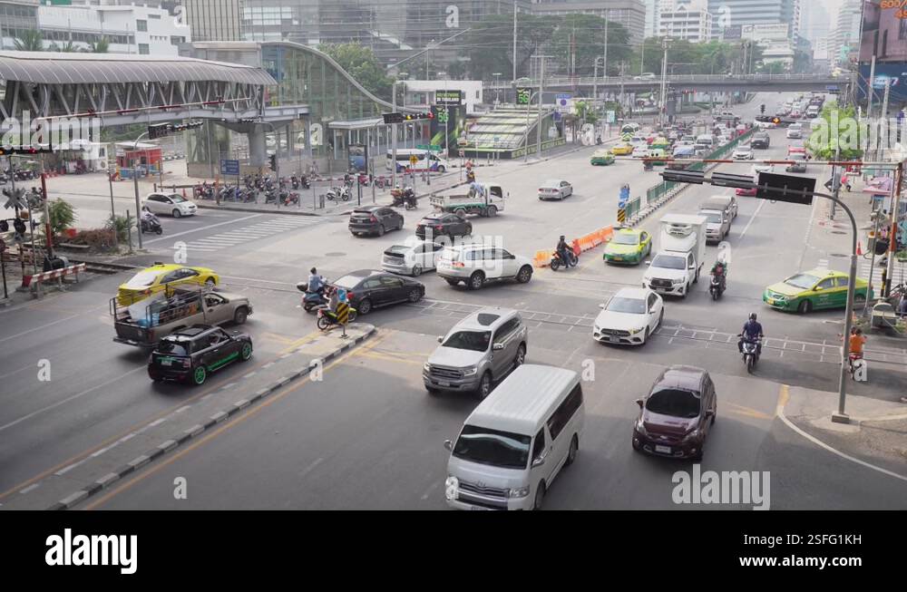 Morning Traffic Along The Intersection Road Near MRT Station In Bangkok ...