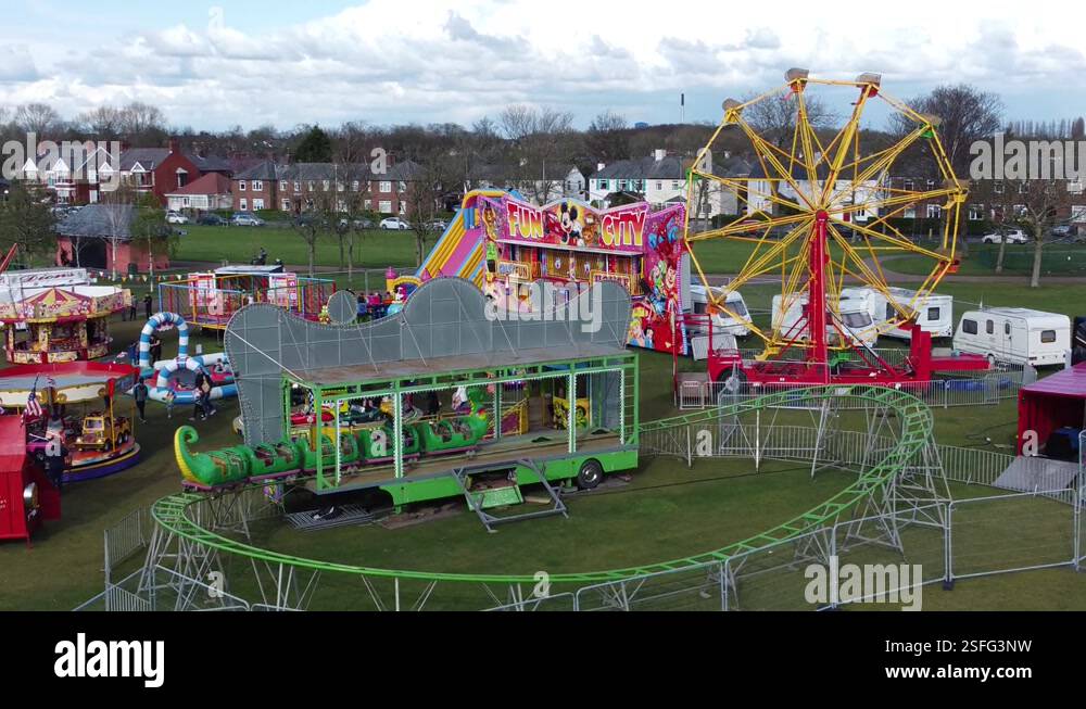 Small town fairground Easter holidays funfair rides in public park ...