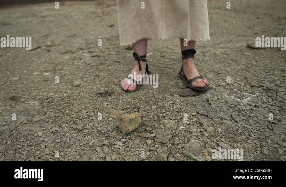 - Walking, feet, Jesus Christ, sandals, rock, hand, grab, pick up, hold ...