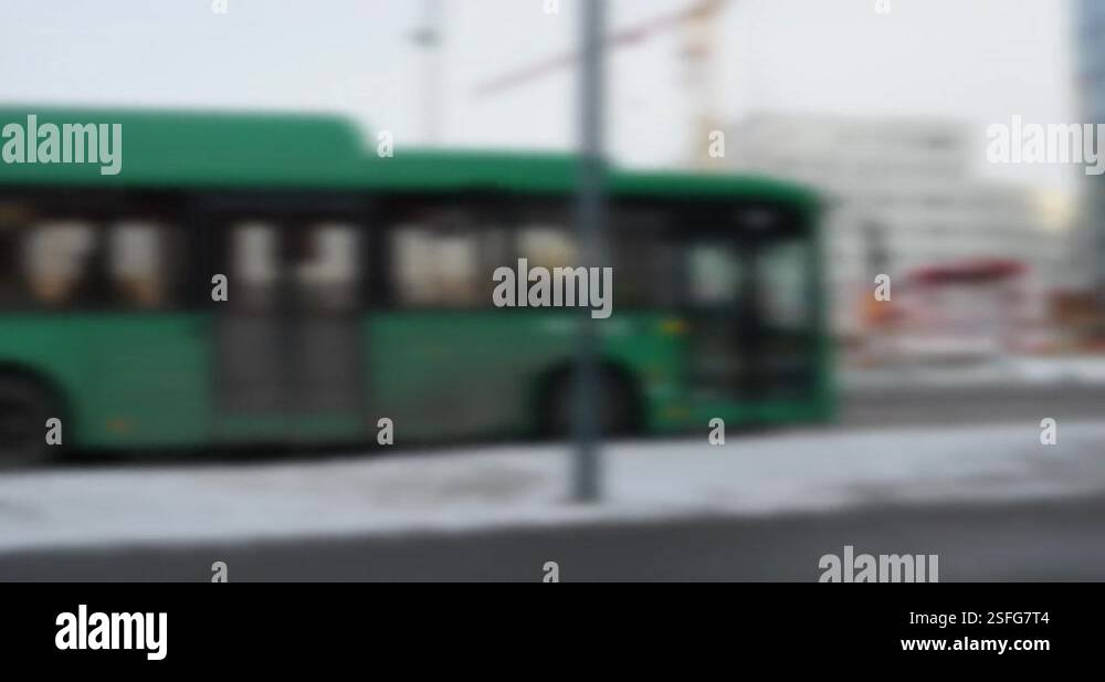 Abstract digital composite 4K UHD footage with green bus driving in ...