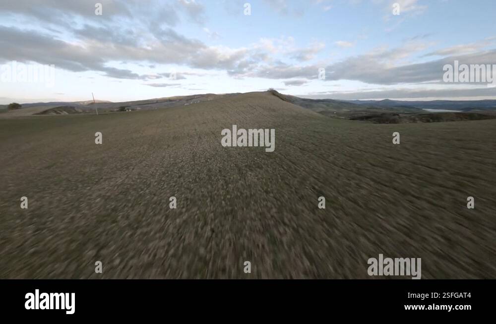 Flying close to the ground at high speed in a land field with an FPV ...