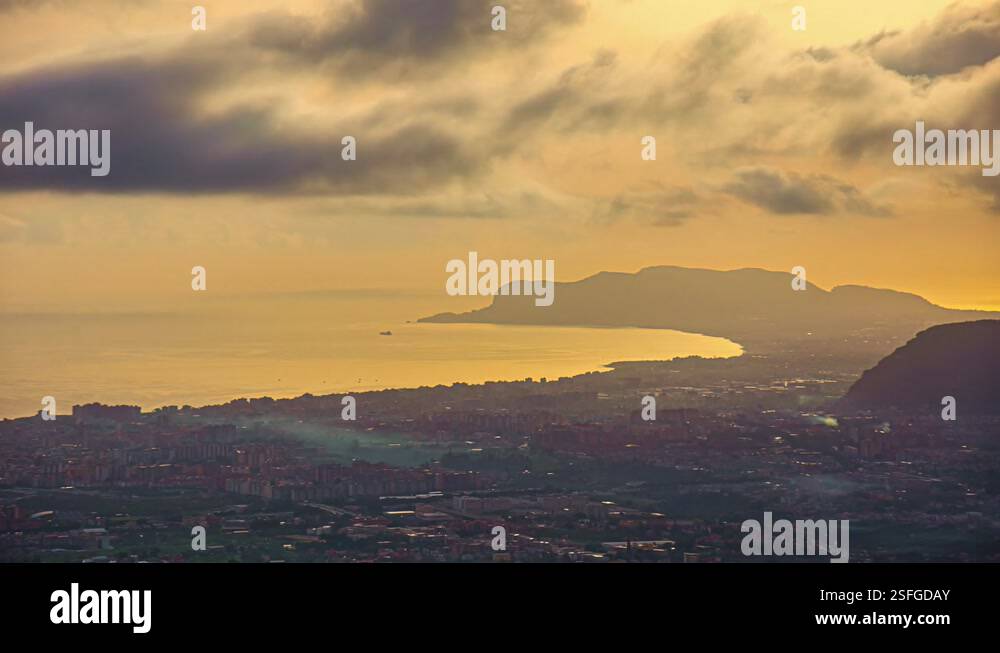 Elevated golden hour time lapse towards sea over Palermo, Sicily, Italy ...
