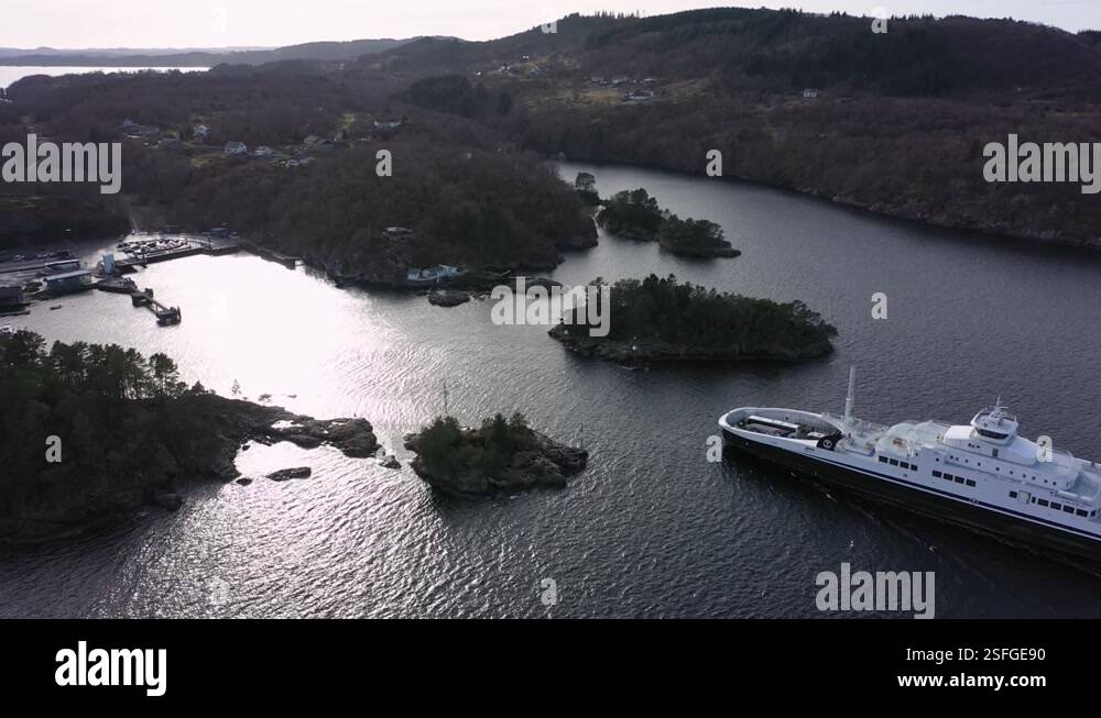 Torghatten Nord ferry Flatoy entering narrow passage when approaching ...