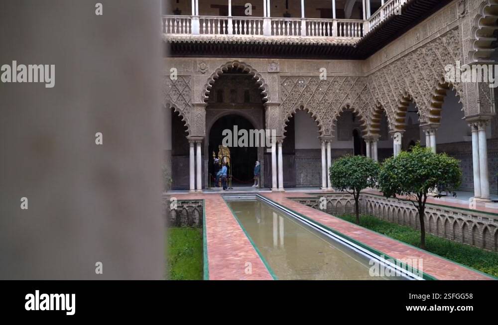 Sliding reveal inside famous Alcazar Palace in Seville, Spain Stock ...