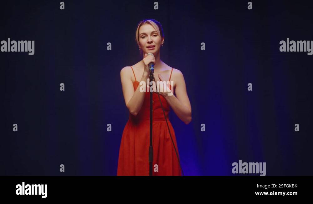 Karaoke cafe. Woman singer close-up. Female musician singing song on ...