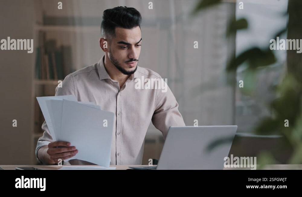 Serious arabian young business guy male professional worker employee ...