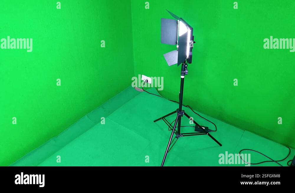 Video shoot lighting equipment on a stand in a filming studio setup ...