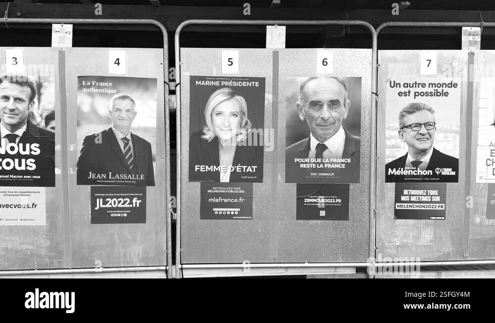 Zoom in to Marine Le Pen face on placard at main school facade in ...