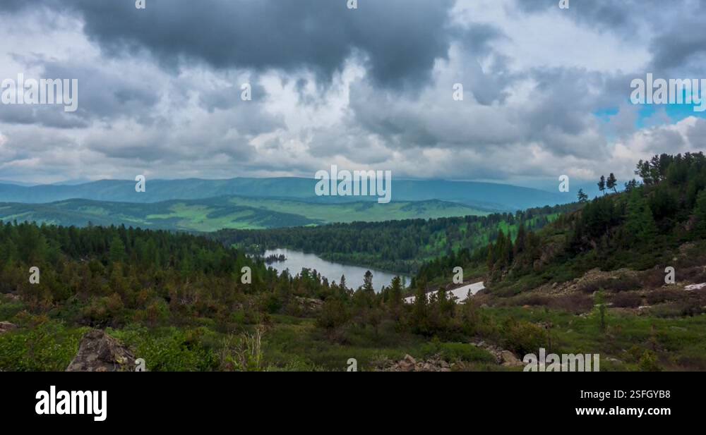 Mountain lake time-lapse at the summer or autumn time. Wild nature and ...