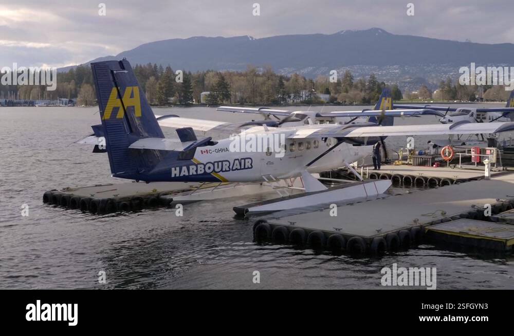 Harbour Air Seaplane At Terminal In Burrard Inlet Getting Ready To Fly ...