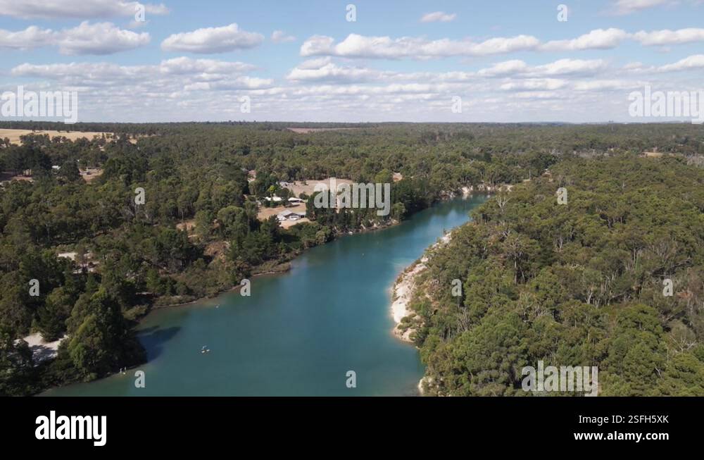 A dynamic aerial shot rotating around the two lakes. Lakes are large ...