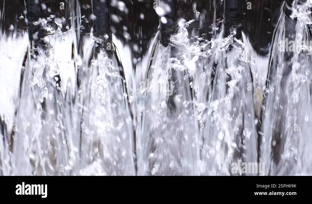 Transparent clear water flowing through steel grates, static Stock ...