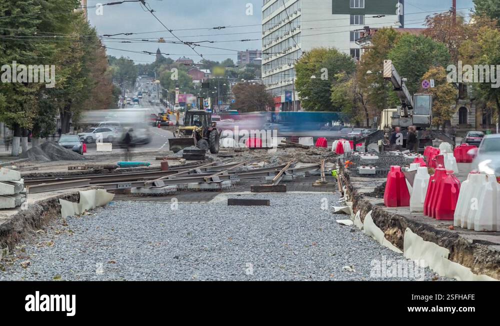 Repair works on the street timelapse. Laying of new tram rails on a ...