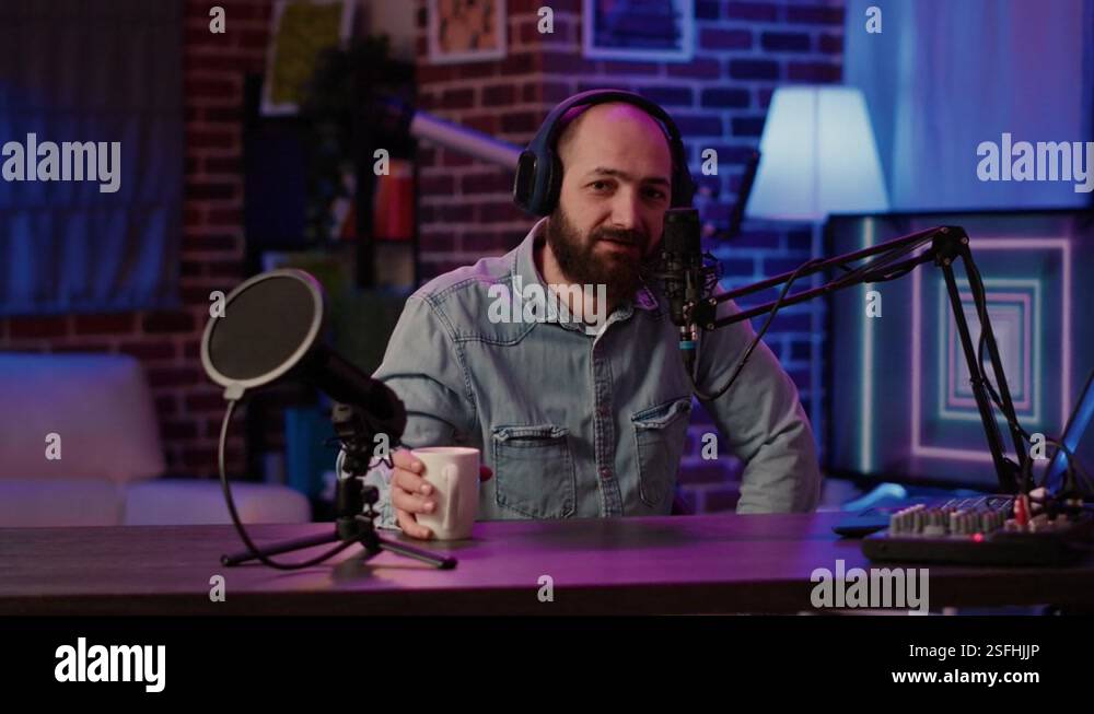 Portrait of online radio host posing casual using professional audio ...