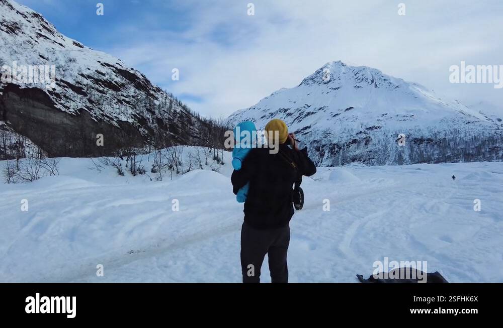 A participant in the 2022 Fat Bike Bash crosses the finish line in ...