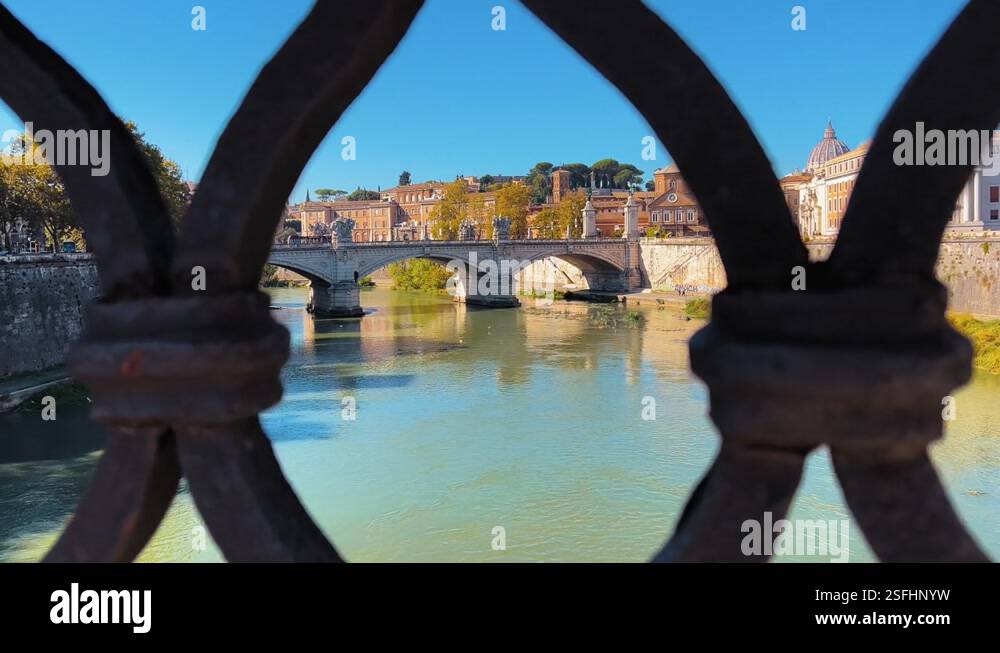 Dolly forward shot showing Tiber River and Angelo Bridge in Rome during ...