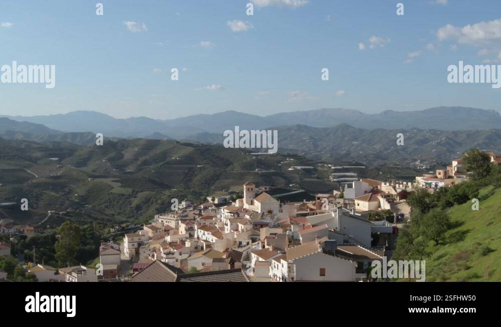 Little village of Iznate between mountains at sunset, Axarquia, Malaga ...