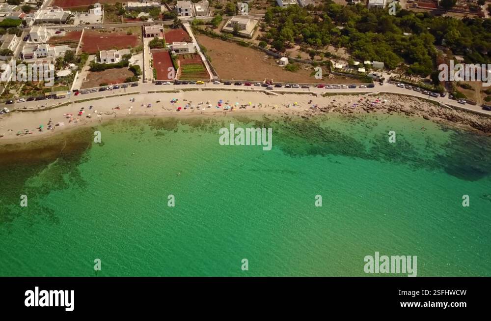 Moving in the sky with a drone: italian beach by the mediterranean sea ...