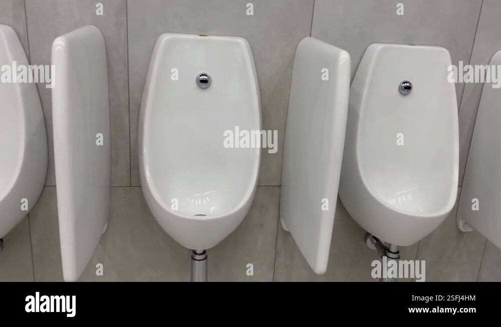 Restroom interior row urinals inside public toilet Stock Video Footage ...