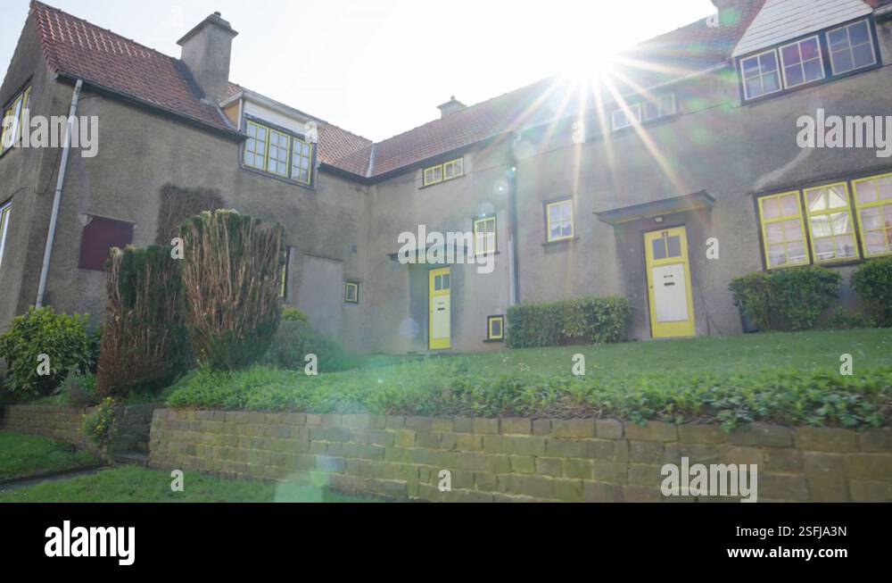 Yellow trim paint adorns the doors and windows of the traditional ...