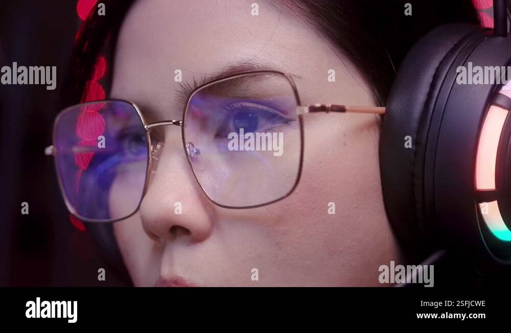 close up of professional Streamer and gamer wearing glasses playing ...