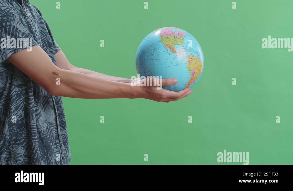 Side View Of A Man In Front Of Green Screen Background Extend The World ...
