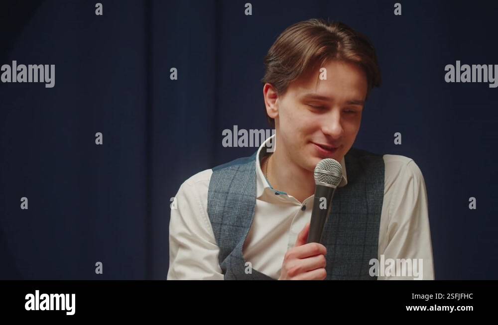 StandUp cafe, comedy concert. Man telling jokes on stage. Male comedian ...