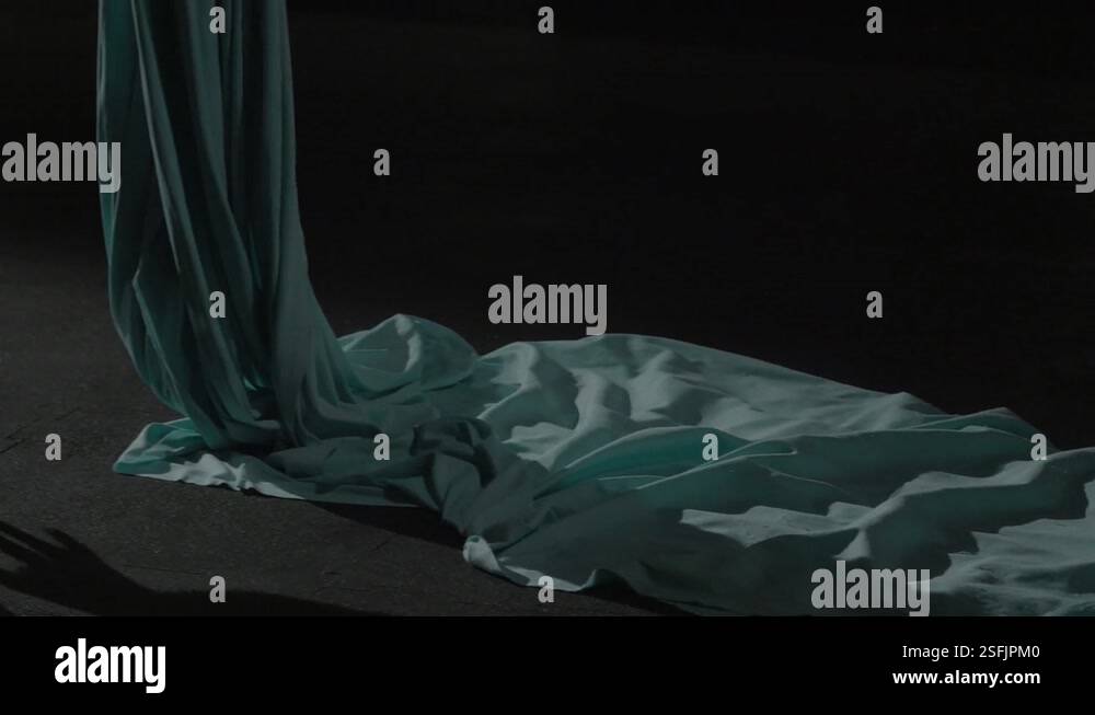 acrobat stands on her hands, the fabric decorates the floor Stock Video ...