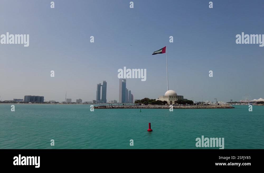 Abu Dhabi modern cityscape with the famous flagpole in frame Stock ...